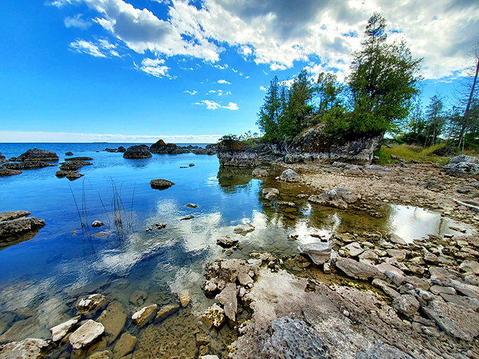Crystal clear shallows reveal underwater worlds where fish dart between rocks and plants in nature's version of high-definition television.