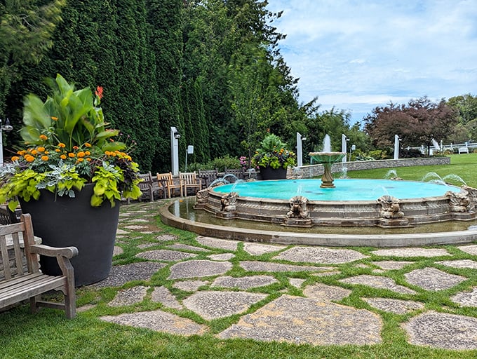 The garden's fountain offers a moment of refreshing tranquility, surrounded by thoughtfully placed benches that whisper, "Sit awhile and stay."