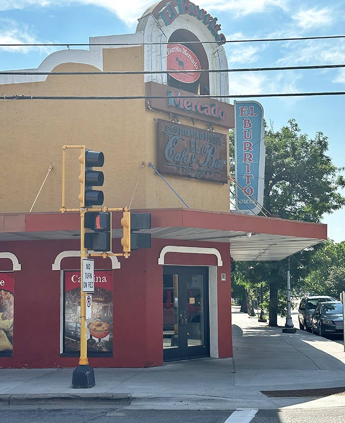 The street view of El Burrito Mercado showcases its distinctive signage and architecture &ndash; a cultural landmark that's been feeding St. Paul's soul for decades.