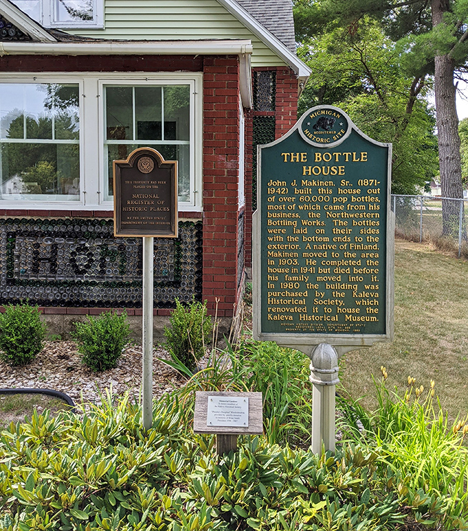 Historical markers tell the bottle house's story, officially recognizing this folk art masterpiece as a significant piece of Michigan's cultural heritage.