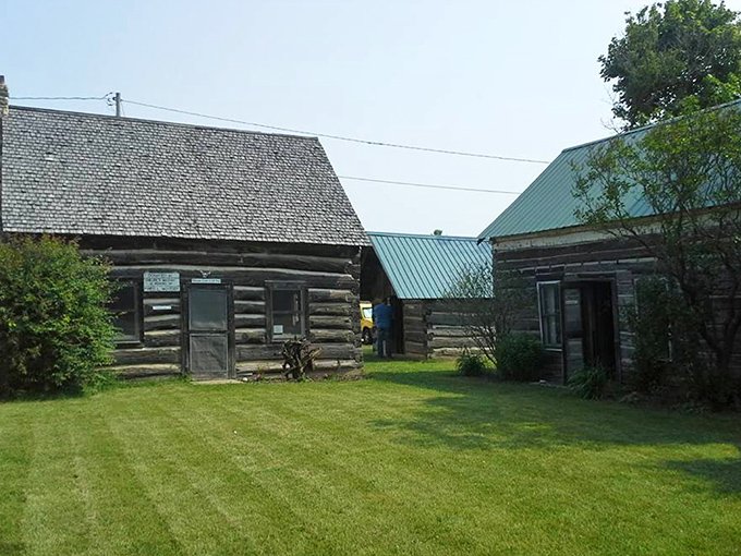 Authentic log structures create an immersive historical landscape where visitors can walk in the footsteps of Michigan's early settlers.