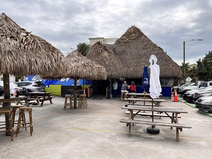 The outdoor seating area invites you to soak up Florida sunshine while enjoying Ka'Tiki's legendary affordable feast under swaying palms.