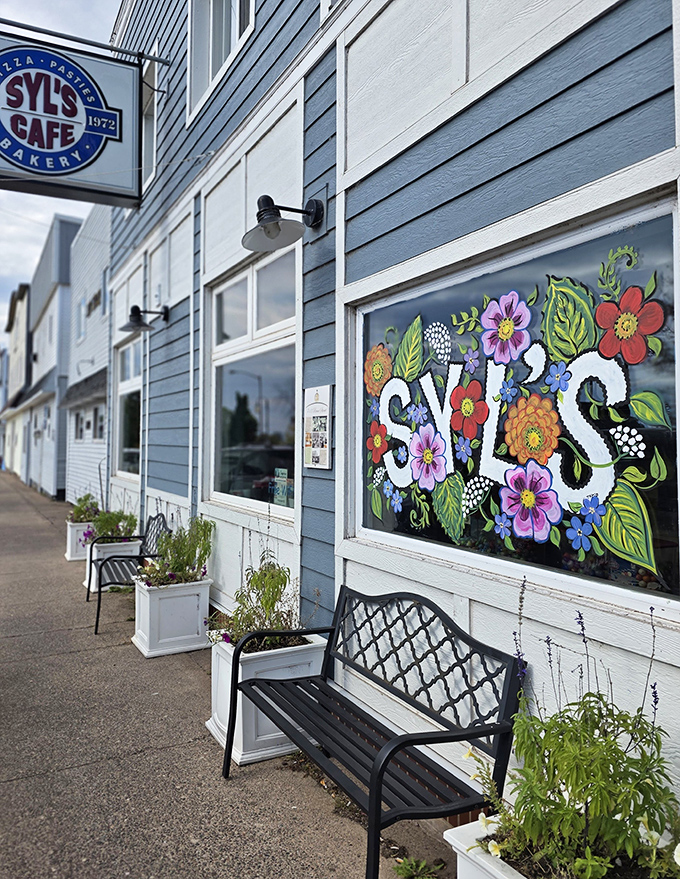 Inviting benches outside Syl's colorful facade &ndash; the perfect spot to savor a sweet treat while watching small-town life unfold.