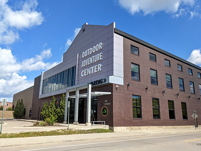 The Outdoor Adventure Center's exterior blends historic architecture with modern design, inviting passersby to discover the wilderness waiting just inside those doors.