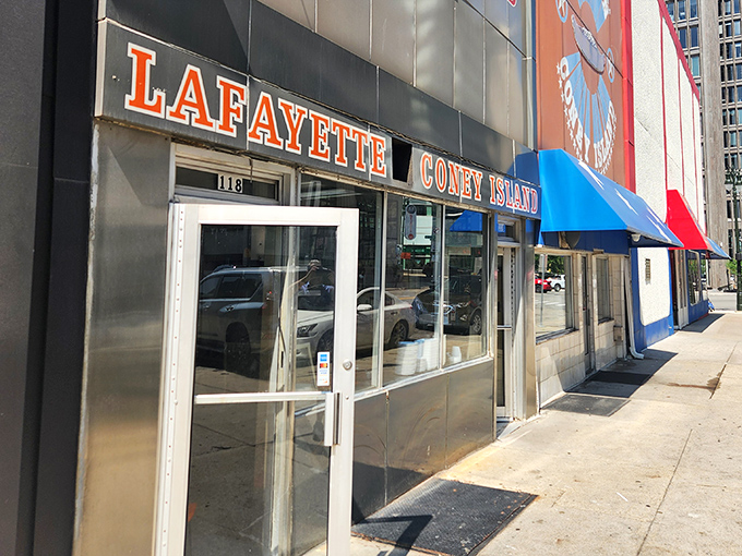 The unassuming entrance to flavor paradise &ndash; proof that greatness doesn't need flashy exteriors, just consistent excellence behind the doors.