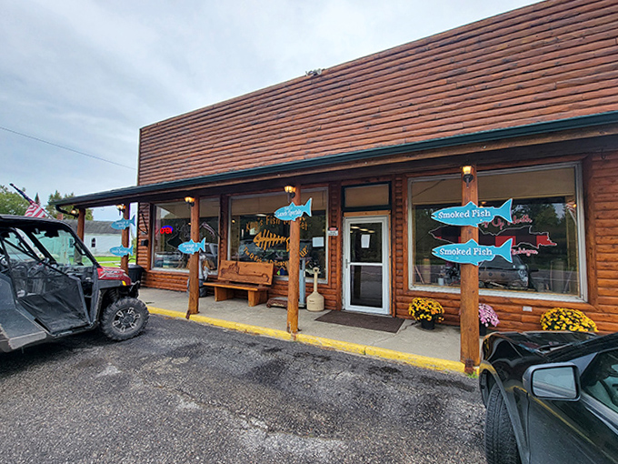 The welcoming exterior promises authentic Upper Peninsula experiences &ndash; a humble wooden structure where pickup trucks outnumber sedans and locals give knowing nods to visitors.
