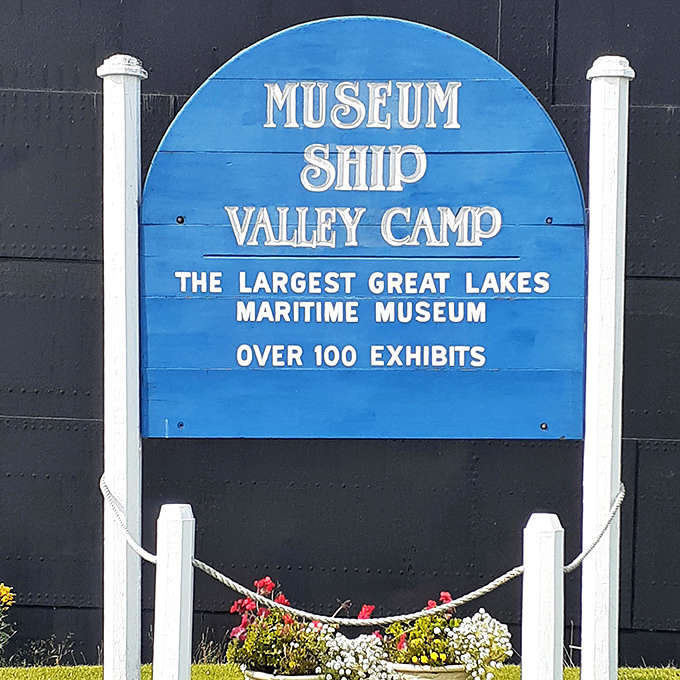 The Valley Camp's distinctive blue and white signage proudly announces its status as the largest Great Lakes maritime museum, with over 100 exhibits awaiting discovery.
