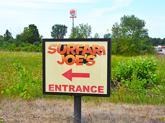 The roadside sign points the way to aquatic adventure,