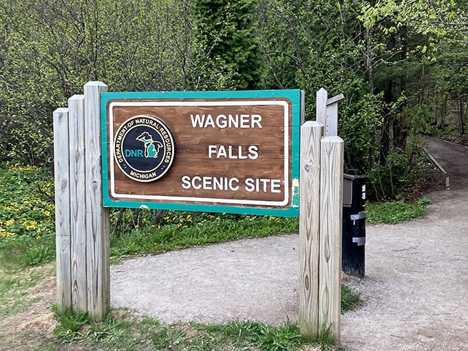 The welcoming entrance sign marks the threshold between ordinary life and the extraordinary natural wonder that awaits just beyond.