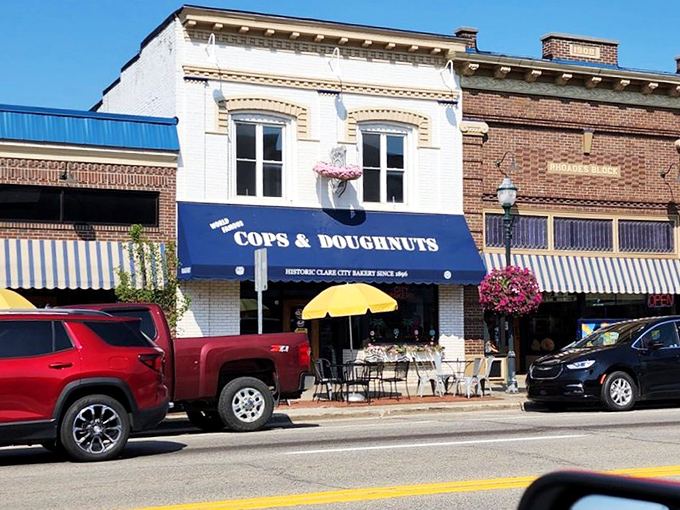 The historic storefront stands as a beacon of community spirit, where nine local officers saved a century-old bakery from closure.