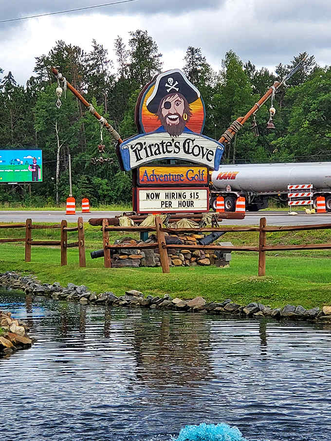The iconic Pirate's Cove sign stands sentinel by the water, a beacon for families seeking that perfect blend of kitsch and quality entertainment.