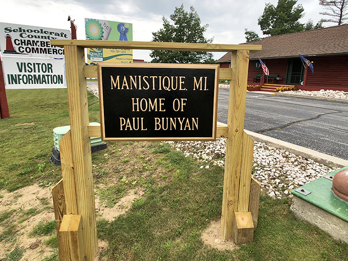 This simple sign announces Manistique's claim to fame, directing visitors to the towering lumberjack who's become the town's unofficial ambassador.