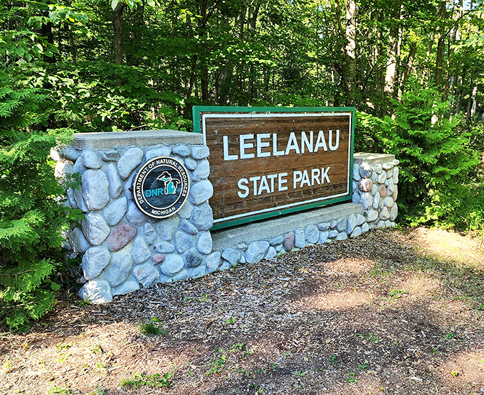 The stone entrance sign promises adventure beyond &ndash; like the opening page of a story you'll never want to end.