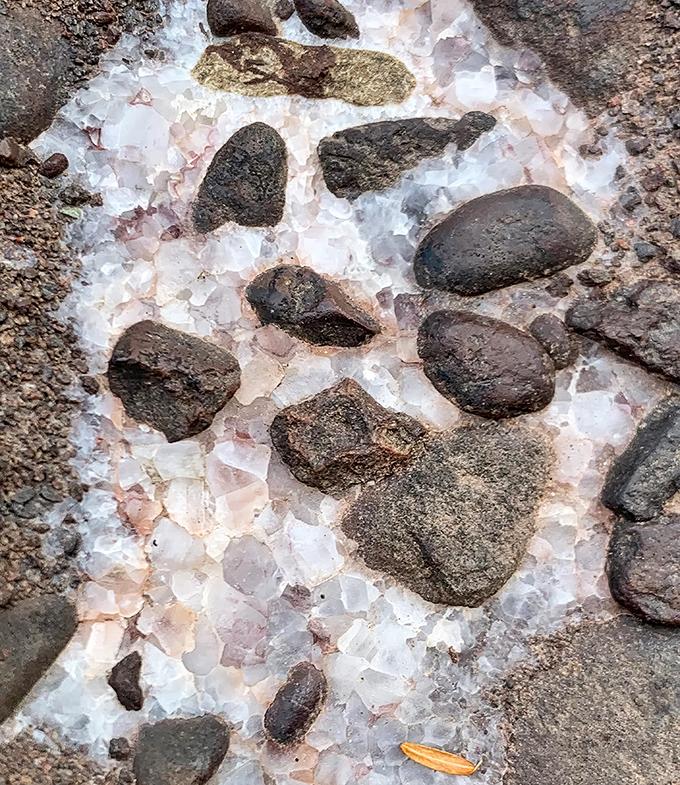 Nature creates its own jewelry box of crystalline formations, where mineral-rich waters leave delicate deposits that glisten like diamonds among the stones.