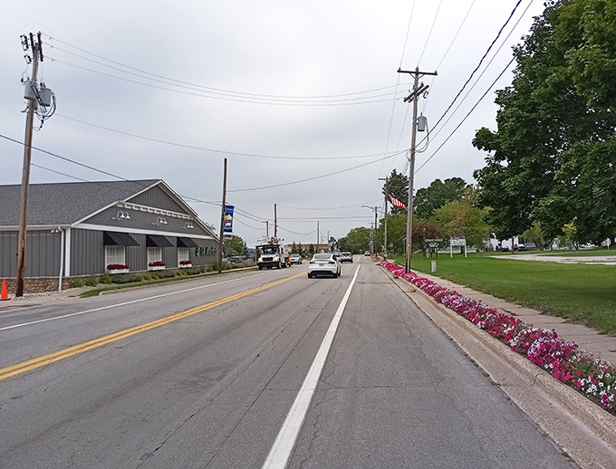 Onekama's flower-lined main street showcases the town's pride and care – small-town charm at its finest.