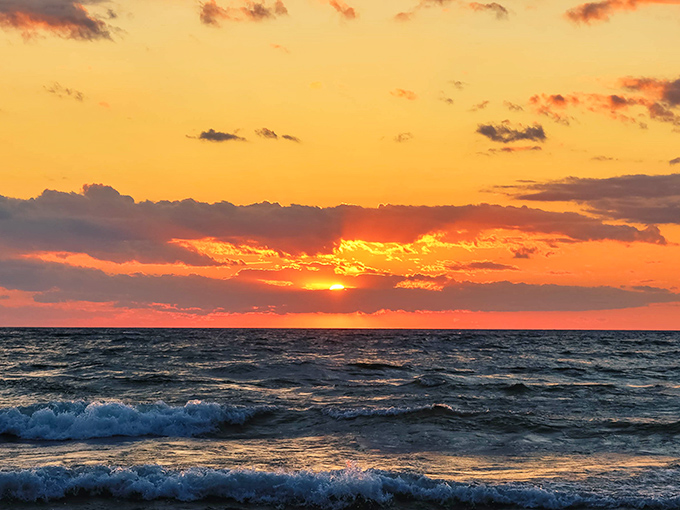 Superior's grand finale: The day ends with nature's own light show, as the sun paints the sky in colors that rival the beach's geological rainbow.