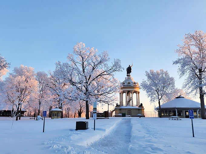 Winter transforms Hermann Heights into a snow-covered wonderland, with the monument standing sentinel over the sleeping Minnesota River Valley.