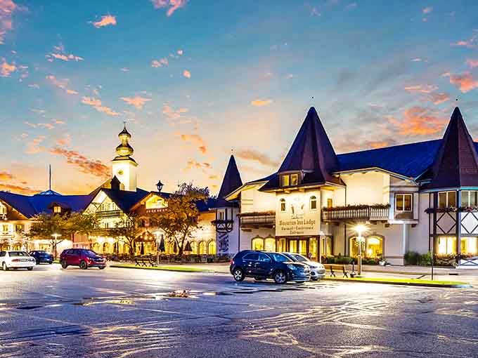 Front view showcasing the lodge's authentic Bavarian design &ndash; half-timbered facades, colorful shutters, and charming details transport visitors to Germany.