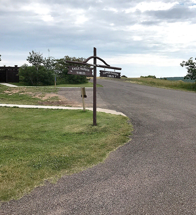 "Eagle Harbor: 10 miles" &ndash; this weathered signpost points the way to adventures that GPS can't quantify.
