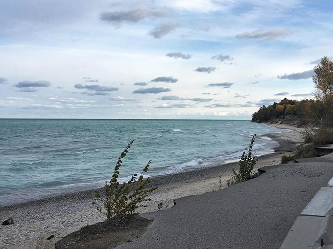 Where Lake Michigan plays dress-up as the Caribbean – Christmas Cove's shoreline stretches invitingly beneath a brilliant blue sky.