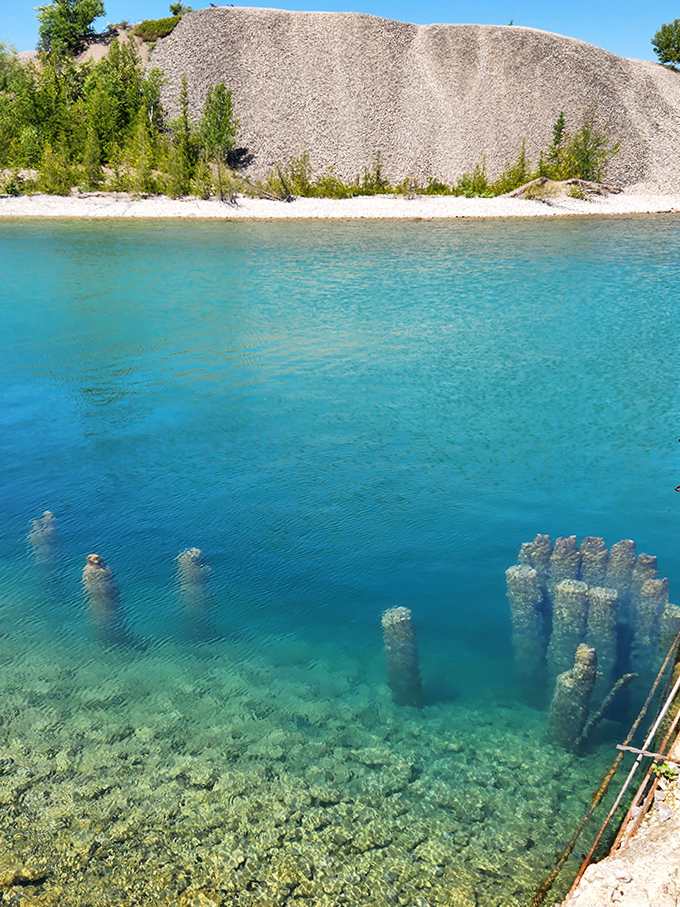 The Caribbean-like waters of Lake Huron reveal incredible clarity, making every swim feel like you're floating in liquid crystal.