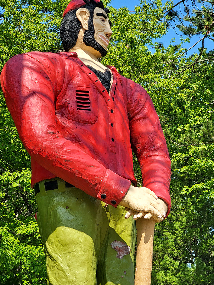 The detailed craftsmanship of Paul's face shows the folksy charm of this roadside giant, complete with his signature lumberjack hat.