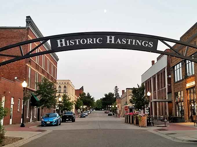 The iconic "Historic Hastings" arch welcomes visitors to a downtown where every brick seems to whisper stories from another era.