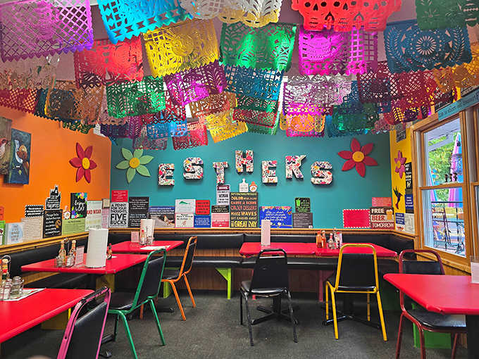Step inside and the fiesta continues overhead &ndash; papel picado banners create a kaleidoscope ceiling that feels like walking into joy itself.