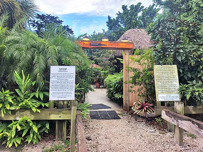 The Faded Bistro & Beer Garden entrance beckons with lush greenery, promising a culinary adventure in a secret garden setting.