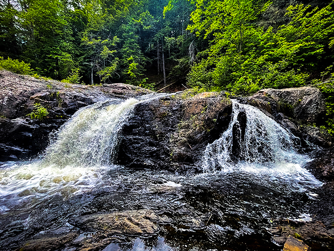 Water splits around ancient volcanic rock like nature's own choose-your-own-adventure story, both paths equally spectacular.