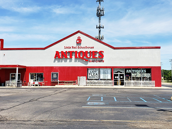 Morning light bathes the front façade, highlighting the charming schoolhouse-inspired architecture that houses countless vintage treasures within.