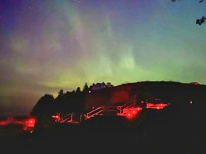 The aurora borealis paints the northern Michigan sky with otherworldly colors, making even non-believers wonder if magic might be real after all.