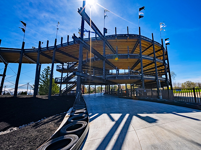 The Indy SkyTrack rises majestically against blue skies, promising thrills that make even grown-ups giggle like schoolchildren.