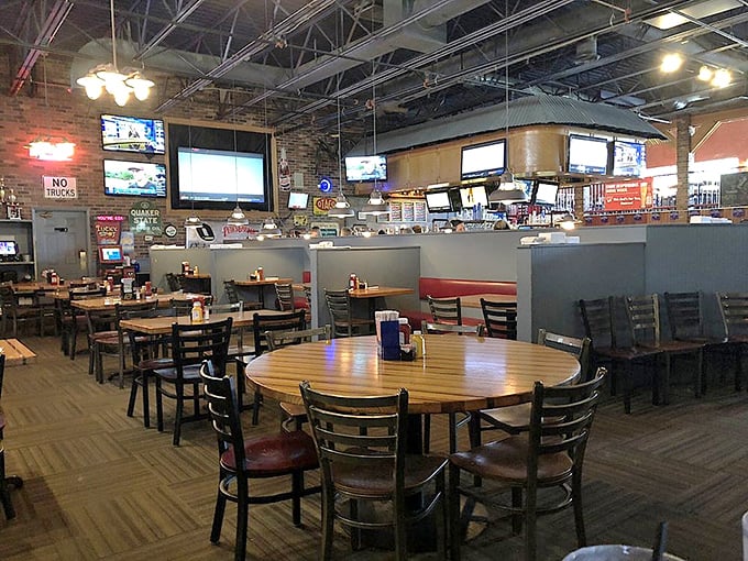 The dining area buzzes with conversation and laughter, while TVs ensure you won't miss the game during your nostalgic feast.