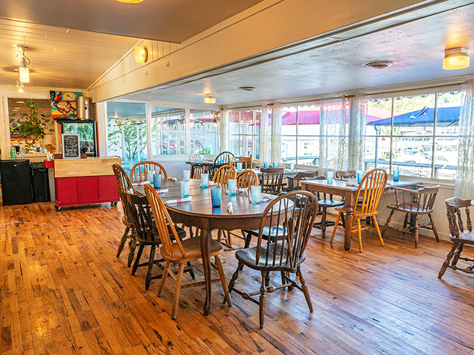 Warm wooden floors and Windsor chairs create that "grandma's dining room" feel &ndash; if grandma had impeccable taste and river views.