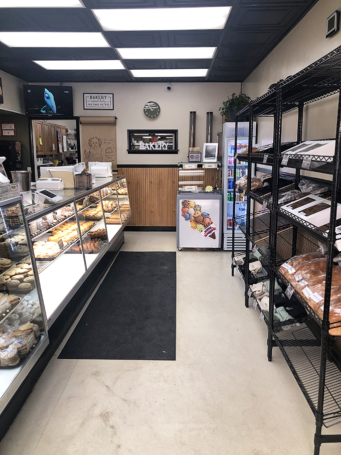 Clean, bright, and focused on what matters: this bakery interior is all business, and that business is making you very, very happy.
