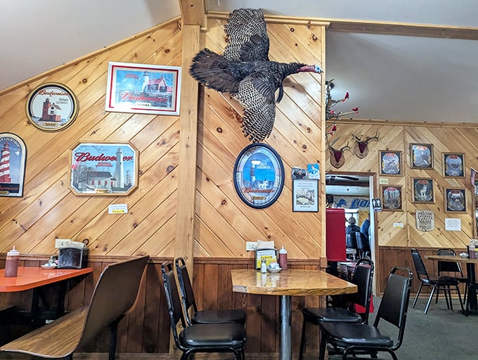 Knotty pine walls adorned with hunting trophies create the perfect Northwoods atmosphere &ndash; like dining in the coziest cabin imaginable.