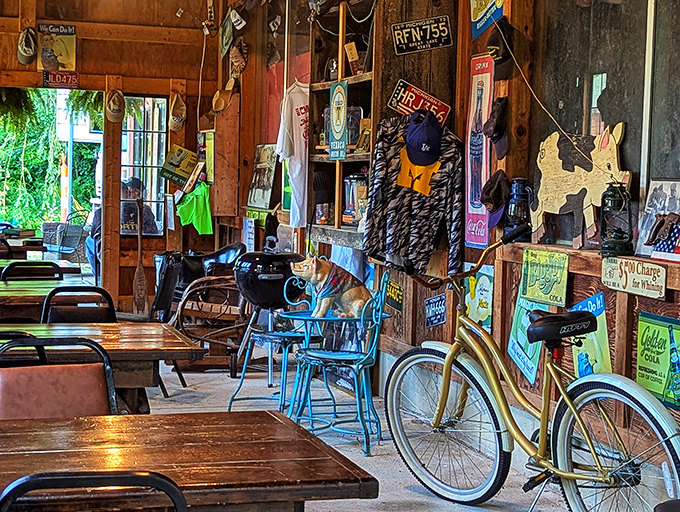 Step inside to a treasure trove of Americana where every inch tells a story – even the bicycle hanging from the ceiling has opinions about brisket.