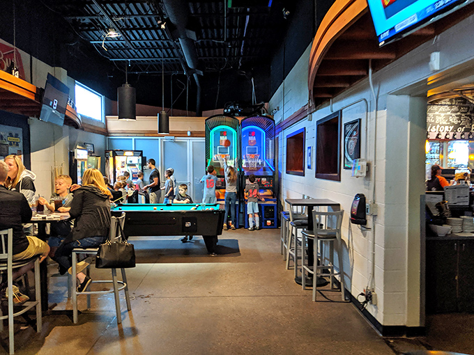 Inside, pool tables and arcade games complement the sports-watching experience, proving paradise doesn't have to choose between fun and games.
