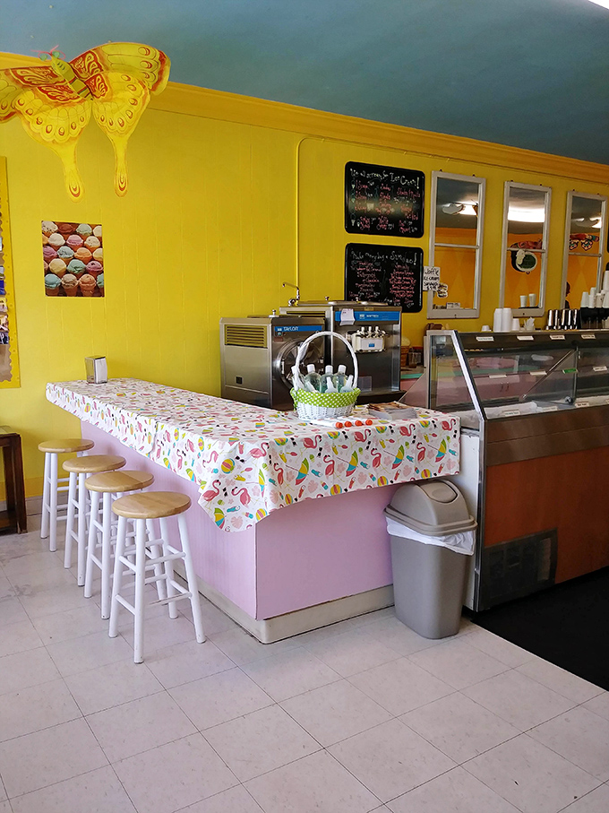 Sunshine-yellow walls and simple furnishings create an unpretentious atmosphere where the ice cream truly takes center stage.