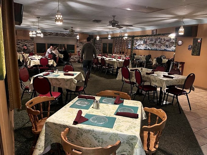 Step inside to a dining room where time slows down – floral tablecloths and red chairs create the perfect backdrop for memorable meals.