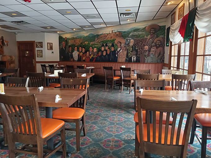 Step inside to discover walls adorned with vibrant murals depicting Mexican cultural scenes&mdash;each brushstroke telling stories while you savor your meal.