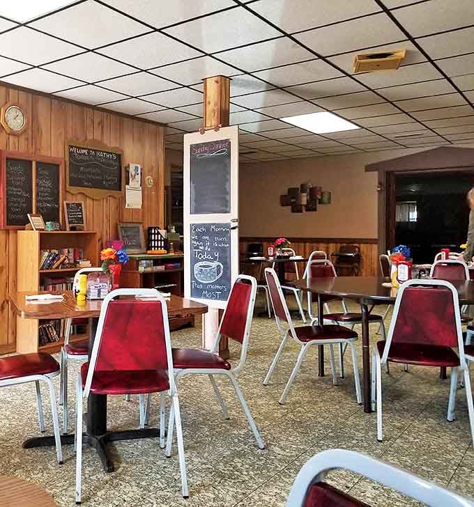 Step inside to a world where red vinyl chairs and wood-paneled walls create the perfect backdrop for comfort food magic.