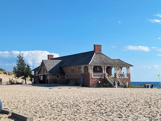 The Lake Michigan Beach House welcomes visitors with its rustic charm, offering shelter and stunning views that make even cloudy days magical.