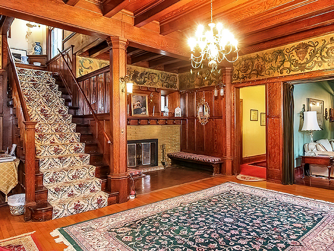 Rich wooden paneling and ornate staircase that practically whispers, "Yes, you ARE the main character in this story."