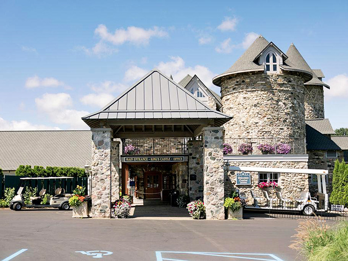 The grand entrance beckons visitors into another world, where stone turrets and castle architecture replace Michigan's typical lakeside views.
