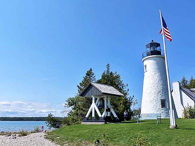 Standing sentinel since 1840, this charming white beacon continues its silent watch over Lake Huron's vast waters.