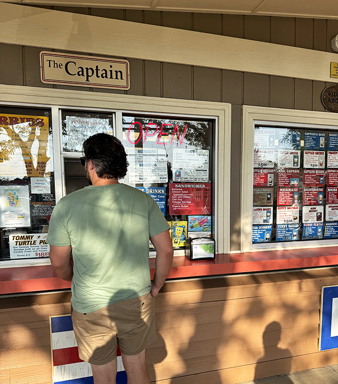 The ordering window, where summer dreams come true, complete with classic barber pole stripes that transport you to simpler times.
