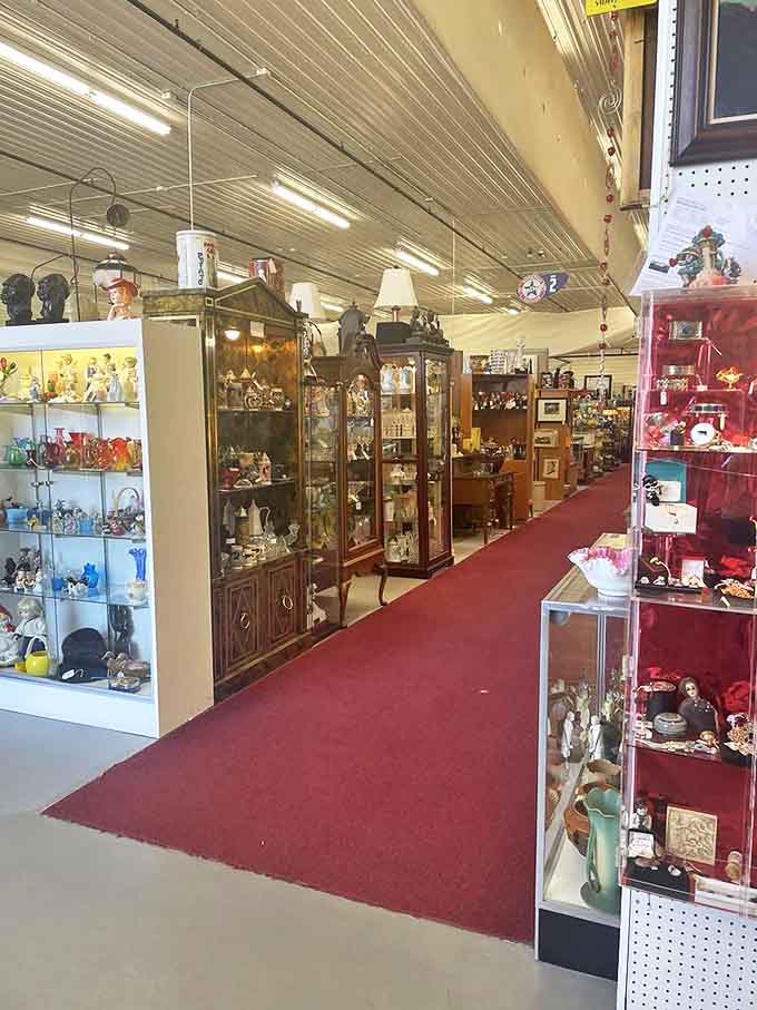 Red carpet pathways lead you through this wonderland of yesteryear, where glass cabinets hold memories waiting to be adopted.