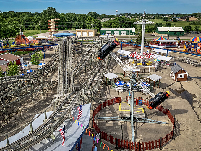 Wooden coaster magic in action! This classic ride delivers just enough excitement without the need for motion sickness medication.
